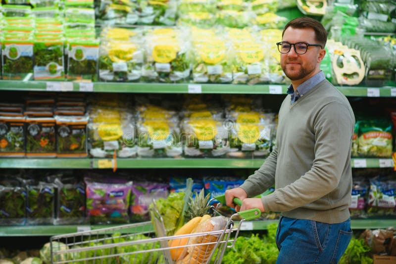 Handsome Man Shopping in a Supermarket Stock Image - Image of online ...