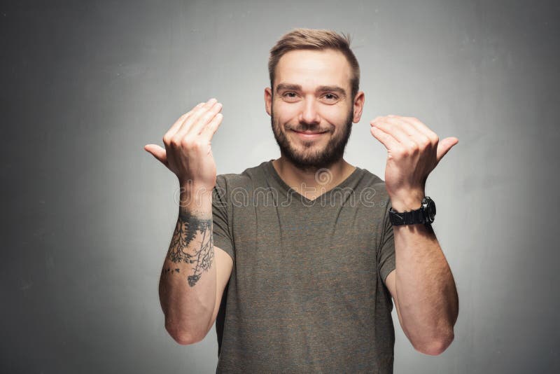 Handsome Man Showing Inviting Gesture. Stock Image - Image of looking ...