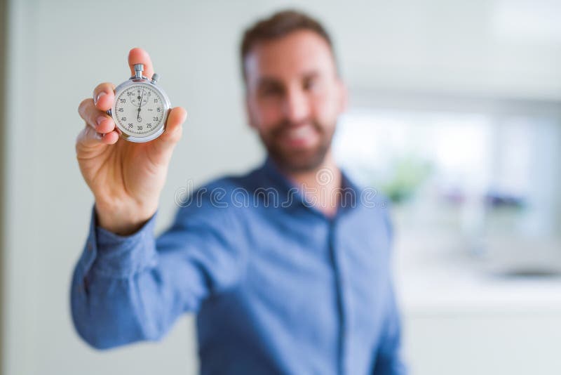 Handsome Man Showing Stopwatch Stock Image - Image of clock, caucasian ...