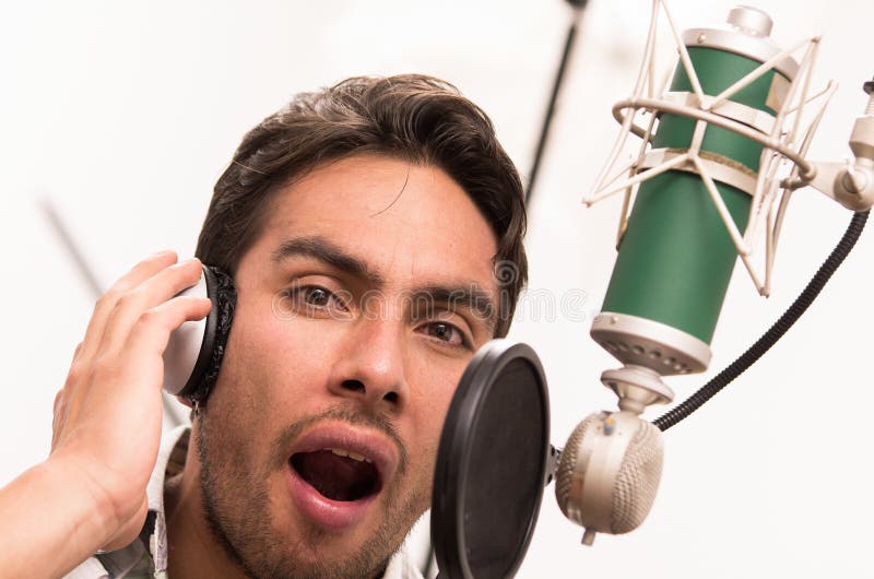 Handsome Man Singing in Music Studio Stock Image - Image of hand ...