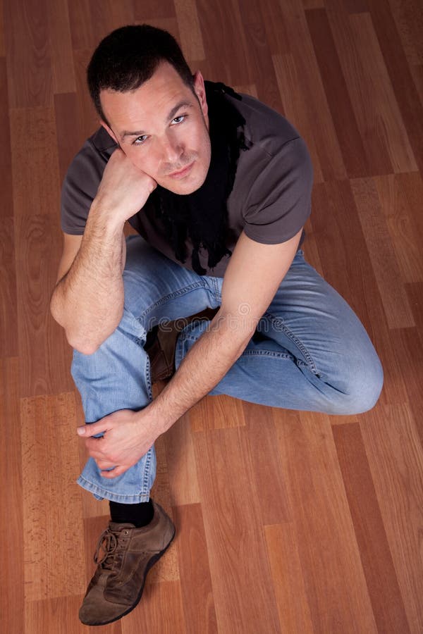 Handsome Man, Sitting on the Floor Stock Photo - Image of handsome ...