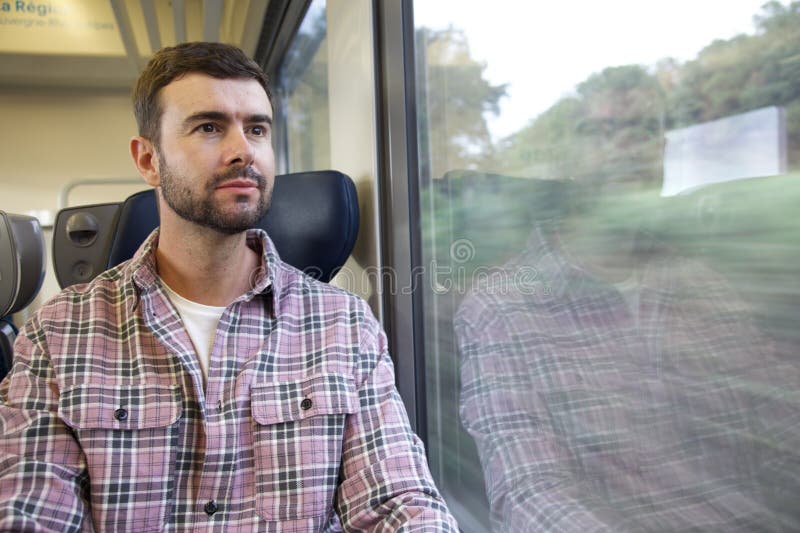 Handsome Man Sitting on Train Stock Image - Image of adult, passenger ...