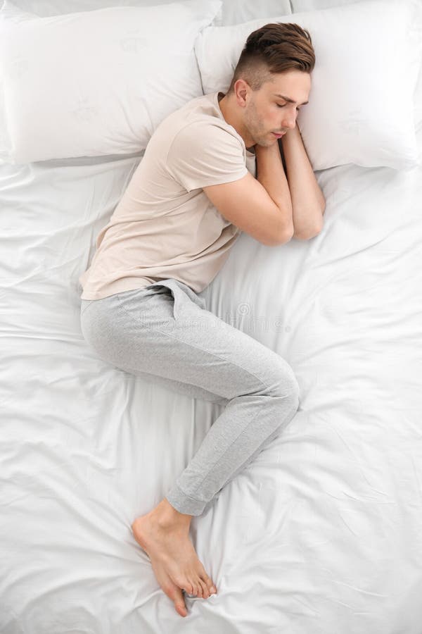Handsome Man Sleeping in Bed at Home Stock Photo - Image of rest, dream ...