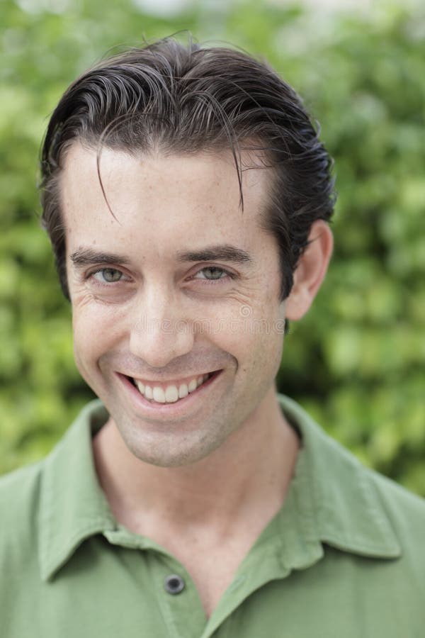 Handsome man smiling stock photo. Image of outdoors, pleased - 17627834