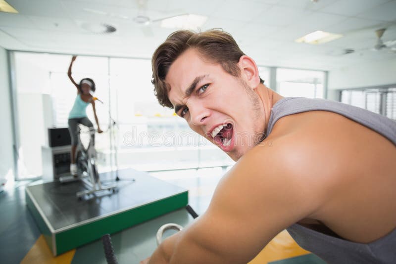 Handsome Man Smiling at Camera in Spin Class Stock Image - Image of ...