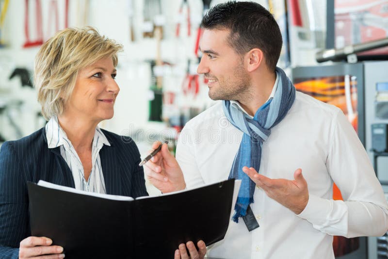 Handsome Man Smiling at Manager Supermarket Stock Image - Image of ...