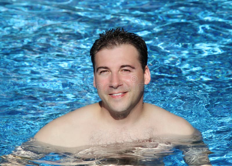 Man Lying on Side of Swimming Pool in the Sun Stock Image - Image of ...