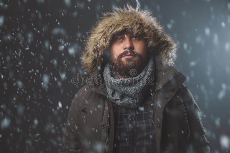 Handsome man in snow storm stock image. Image of vacation - 48744901