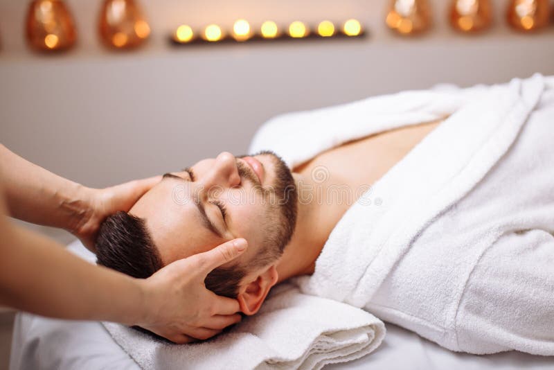 Handsome Man during Spa Massaging Session Stock Photo - Image of ...
