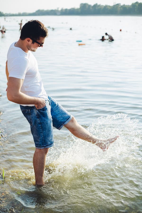 Man Splashing Water In Sea Picture. Image: 83036722