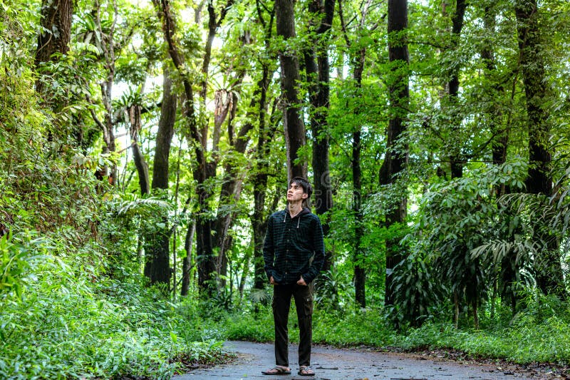Handsome Man Standing Alone while Looking Around. Beautiful Dramatic ...