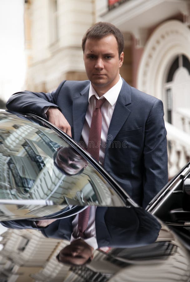 Handsome Man Standing Near Car Stock Image - Image of company, black ...