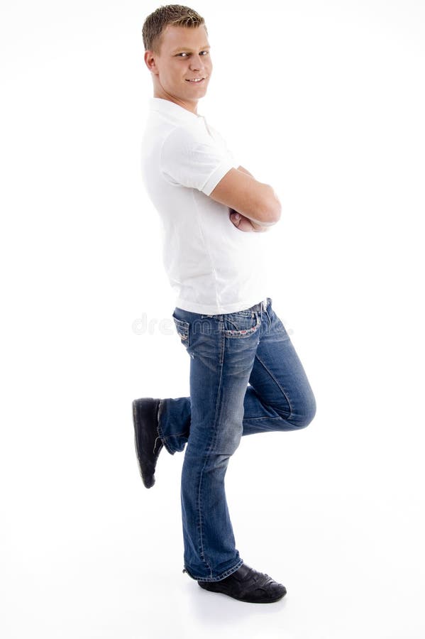 Happy Young Man Leaning Against Wall Stock Image - Image of full ...