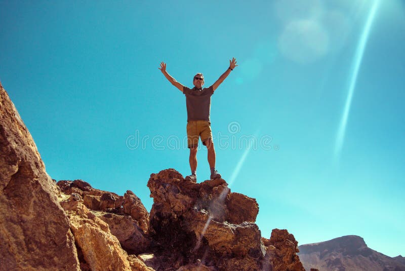 Handsome Man Standing on the Rock Stock Image - Image of body, energy ...