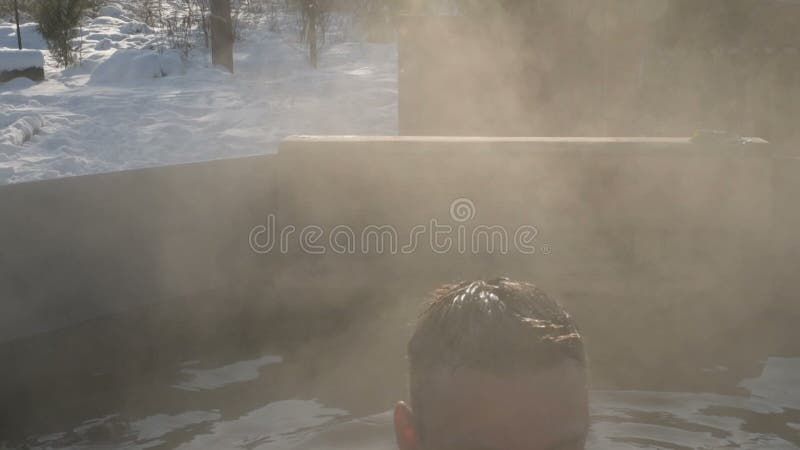 Man Steamed in a Bath in the Hot Water Outdoors Stock Video - Video of ...