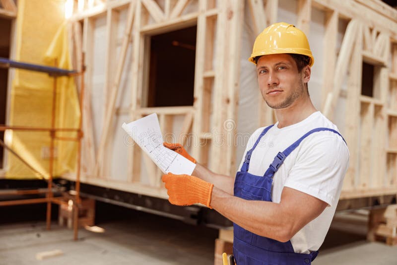 Handsome Man Studying Architectural Plan at Construction Site Stock ...