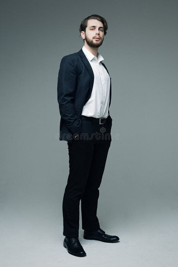 Handsome man in suit stock image. Image of cool, chair - 56950269