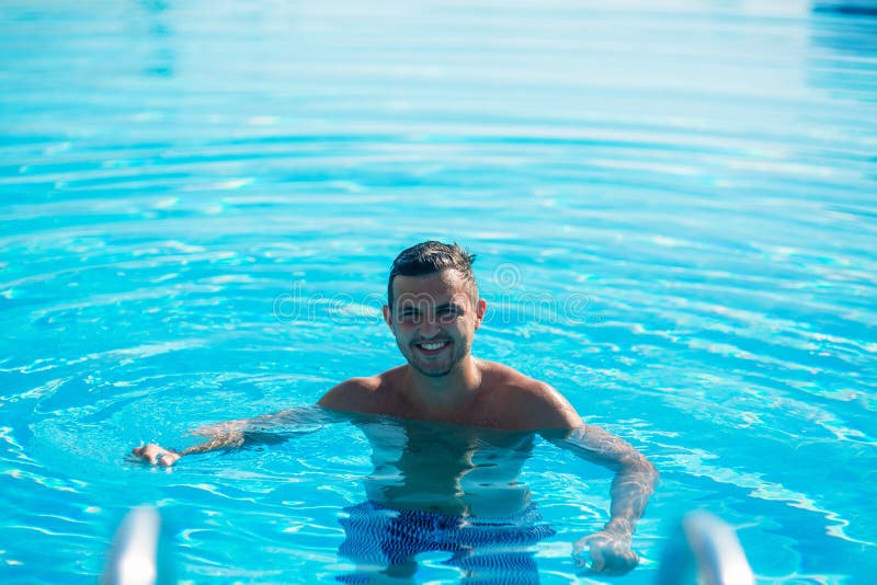 Handsome Man in Swimming Pool. Summer Day. Resort Stock Photo - Image ...