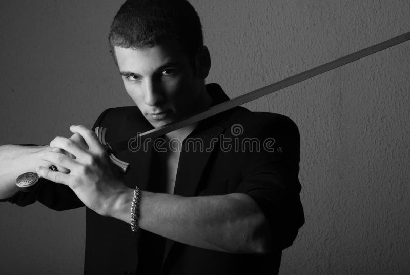 Man with sword stock photo. Image of posing, holding, close - 9845820