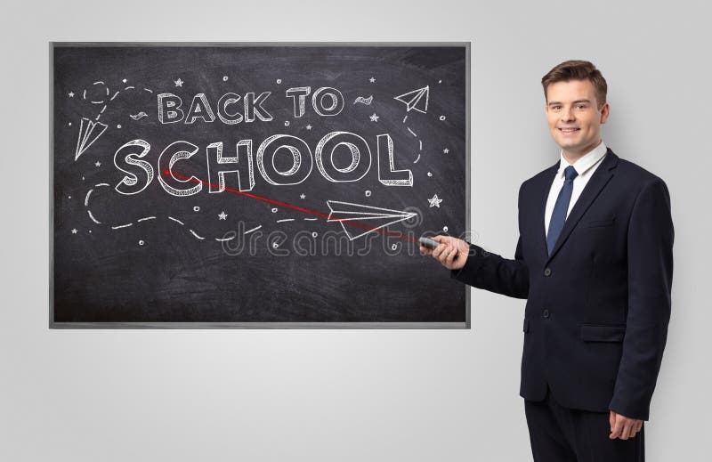 Handsome Man Teaching in Classroom Stock Photo - Image of happy ...