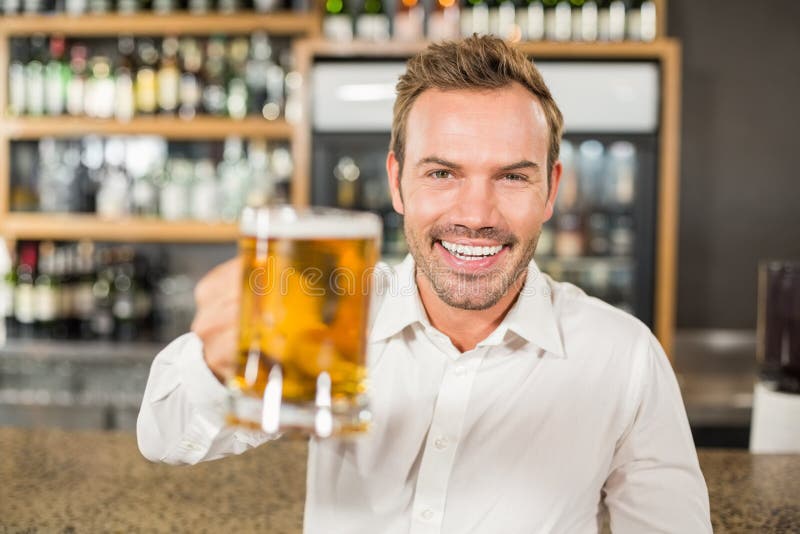 Handsome man toasting stock image. Image of sitting, caucasian - 67729231