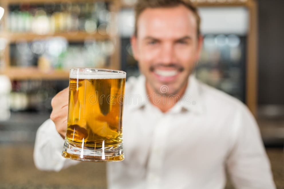 Handsome man toasting stock image. Image of sitting, caucasian - 67729231