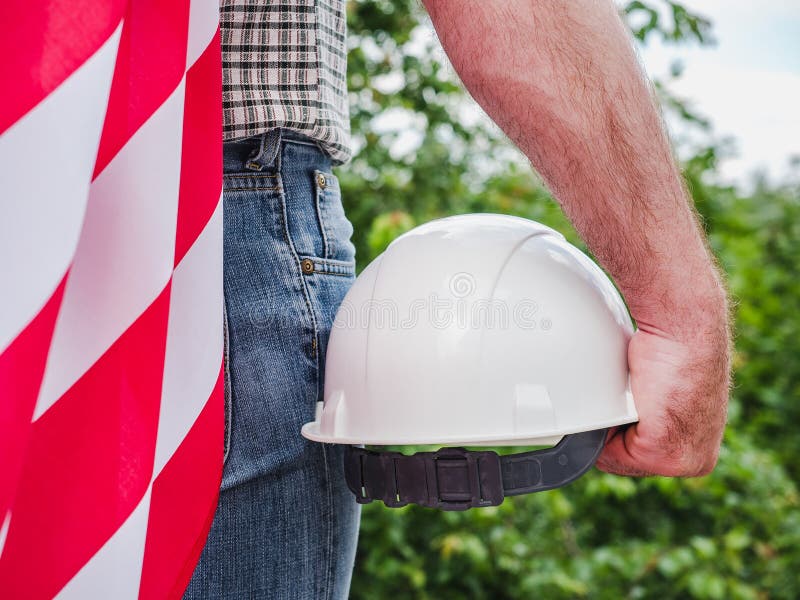 Handsome Man with Tools, Holding an American Flag Stock Photo - Image ...