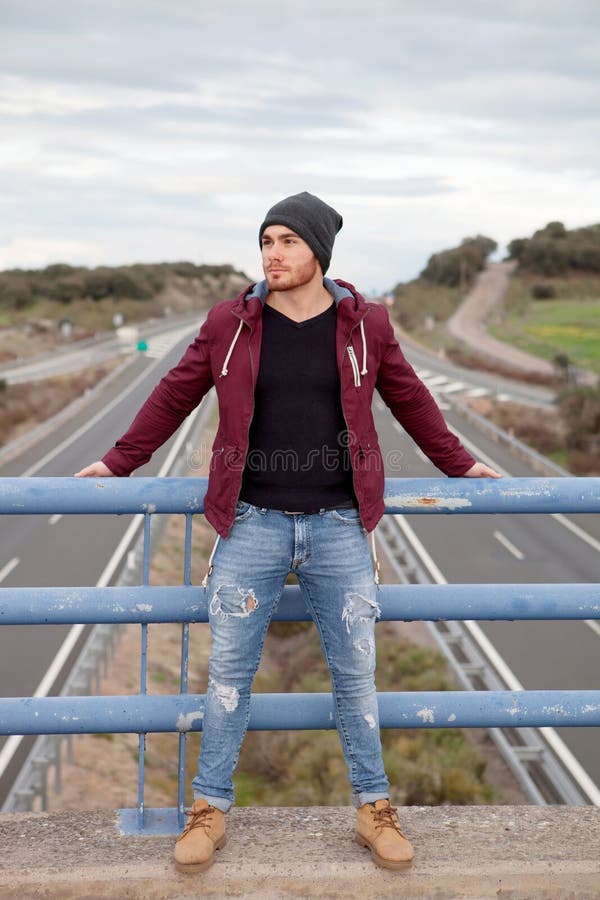 Handsome Man at the Top of a Bridge Over a Highway Stock Photo - Image ...