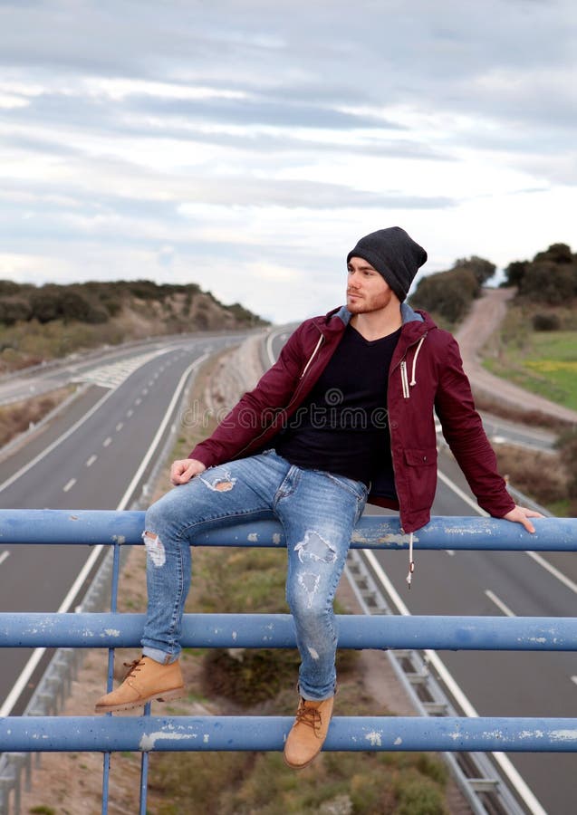Handsome Man at the Top of a Bridge Over a Highway Stock Image - Image ...