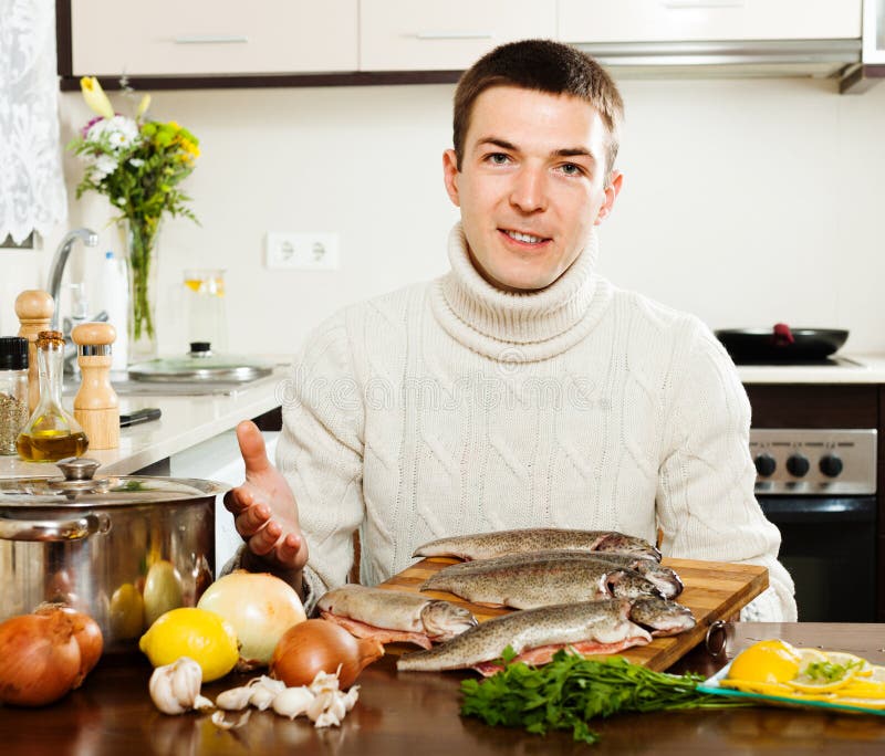 Handsome Man with Trout Fish Stock Image - Image of trucha, home: 36375003