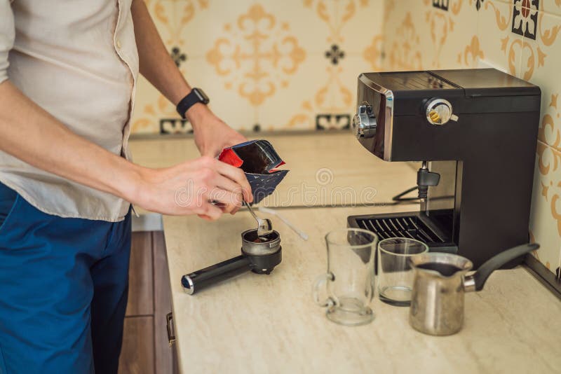 Handsome Man Using Coffee Machine in Kitchen Stock Photo - Image of ...