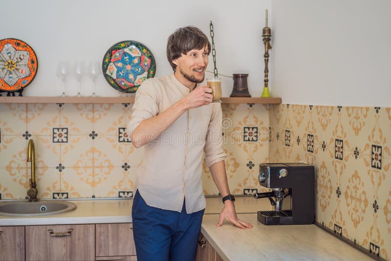 Handsome Man Using Coffee Machine in Kitchen Stock Image - Image of ...