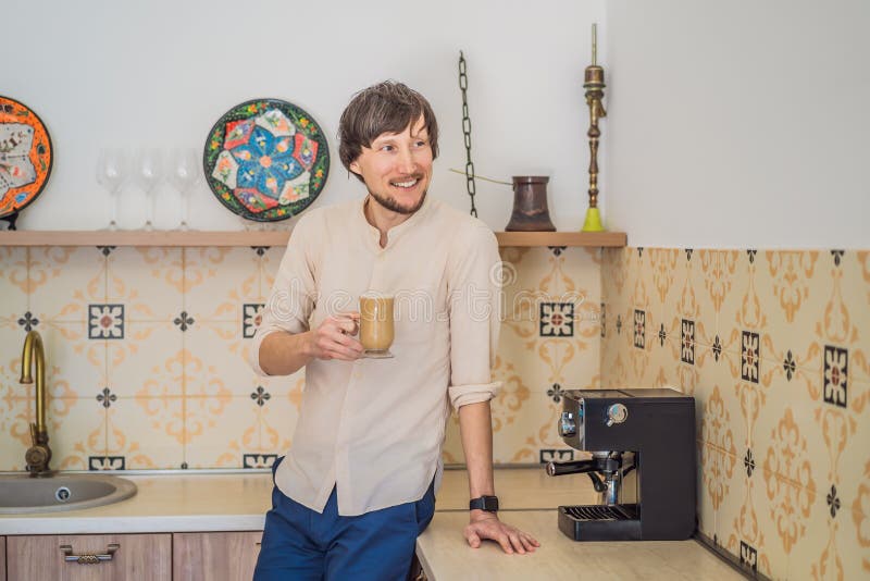 Handsome Man Using Coffee Machine in Kitchen Stock Photo - Image of ...