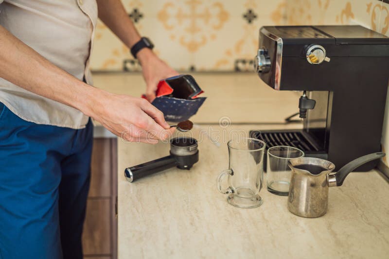 Handsome Man Using Coffee Machine in Kitchen Stock Photo - Image of ...