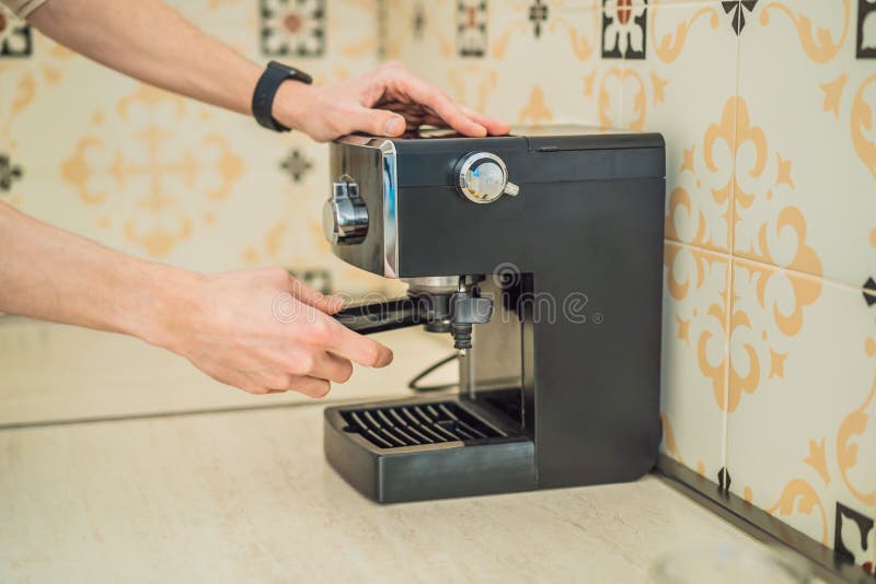 Handsome Man Using Coffee Machine in Kitchen Stock Photo - Image of ...