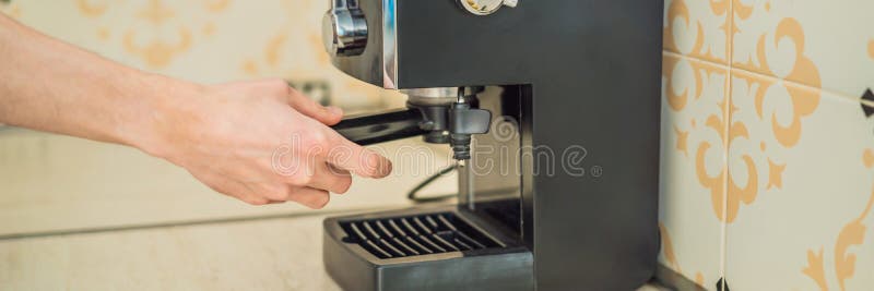 Handsome Man Using Coffee Machine in Kitchen BANNER, LONG FORMAT Stock ...