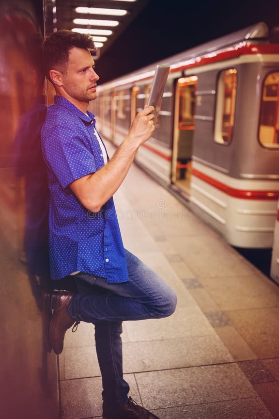 Handsome Man Using Digital Tablet at Railway Station Stock Image ...