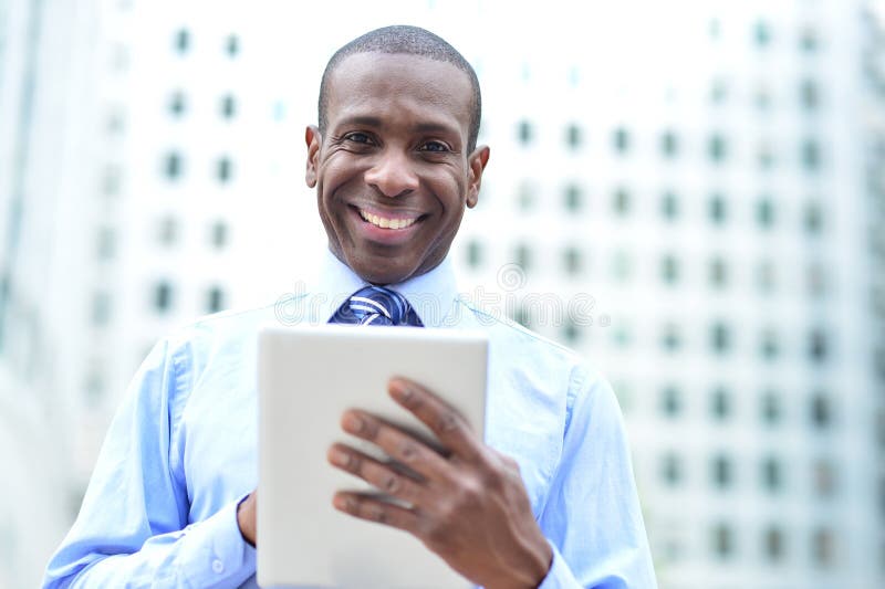 Handsome Man Using His Tablet Computer Stock Image - Image of hand ...