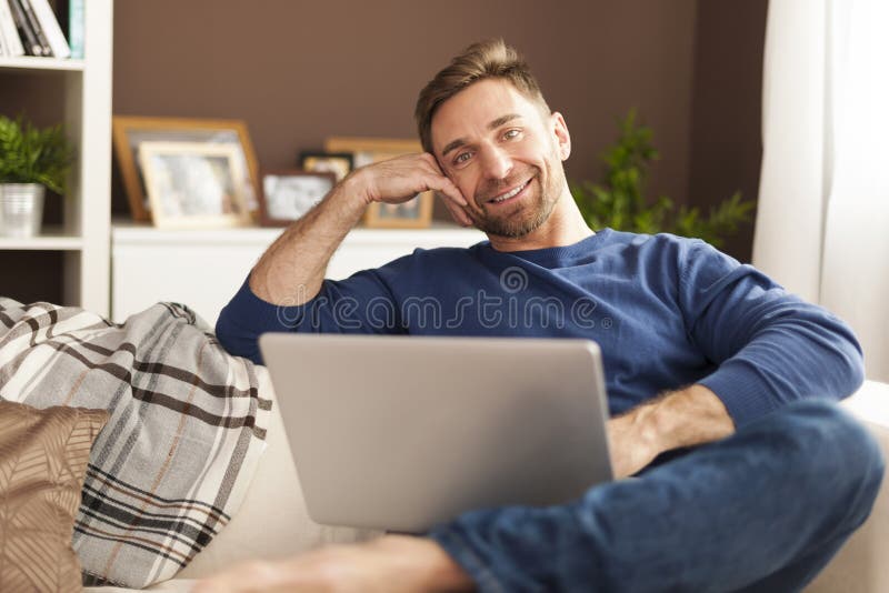 Handsome man using laptop stock photo. Image of handsome - 40868608