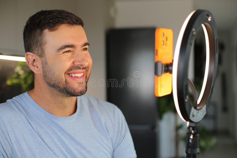 Handsome Man Using a Light Ring Stock Photo - Image of light, podcast ...