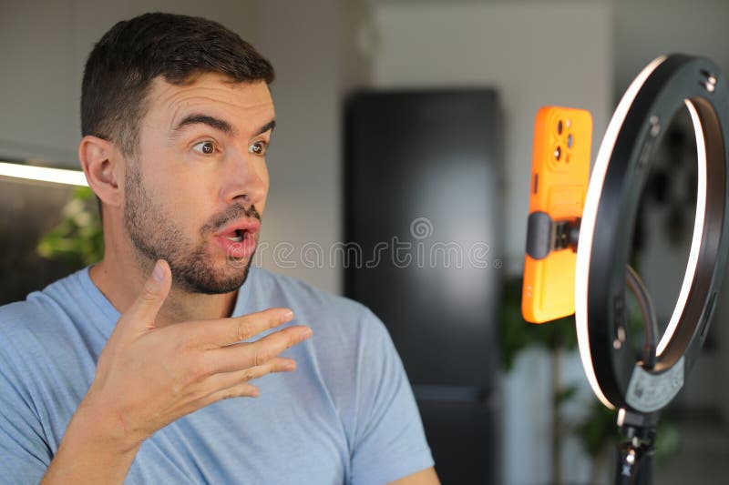 Handsome Man Using a Light Ring Stock Photo - Image of influencer, live ...