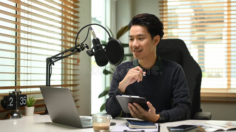Handsome Man Using Microphone while Streaming Audio Podcast at Home ...