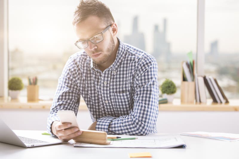 Handsome man using phone stock image. Image of business - 78276983