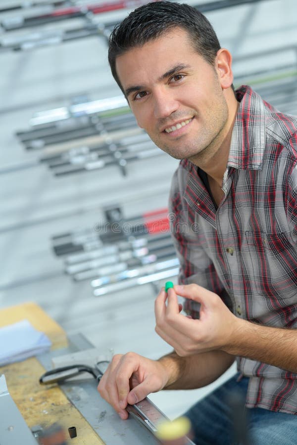 Handsome Man Using Ruler in Workshop Stock Photo - Image of calliper ...