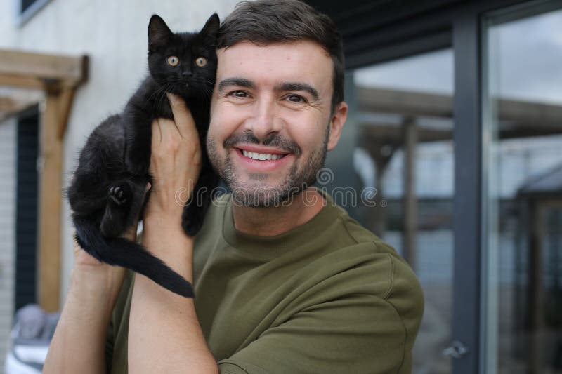 Handsome Man with a Very Cute Black Baby Cat Stock Photo - Image of ...