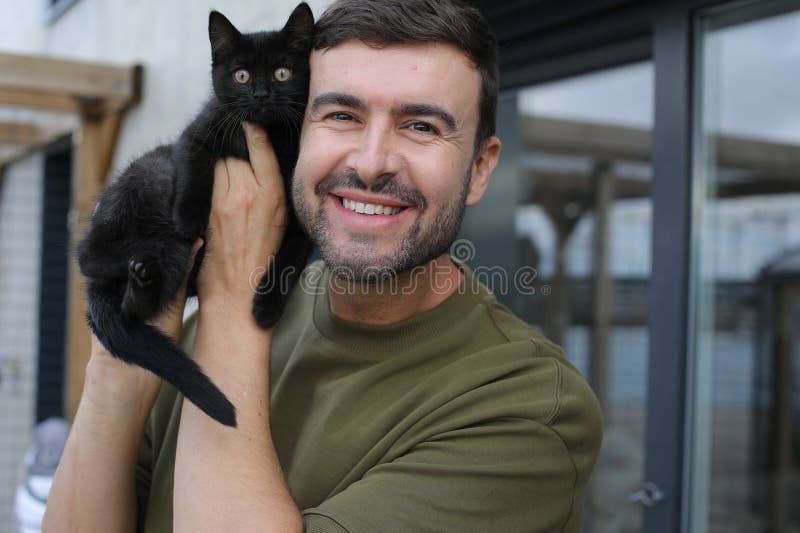Handsome Man with a Very Cute Black Baby Cat Stock Photo - Image of ...