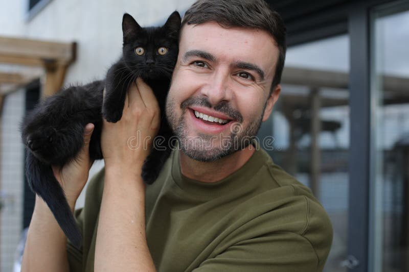 Handsome Man with a Very Cute Black Baby Cat Stock Image - Image of ...