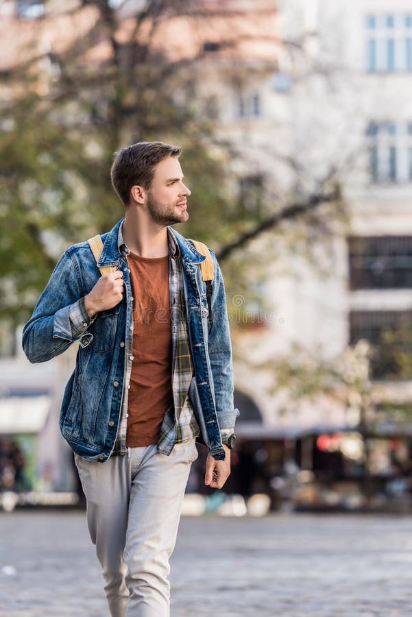 Man Walking Away Backpack Brown Jacket Stock Photos - Free & Royalty ...