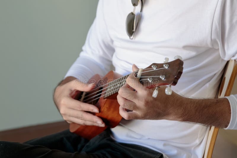 Handsome Man Playing Ukulele Stock Photo - Image of beautiful, people ...