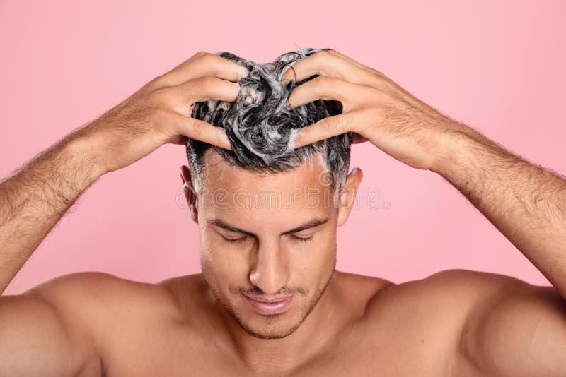 Handsome Man Washing Hair on Light Blue Background Stock Photo - Image ...